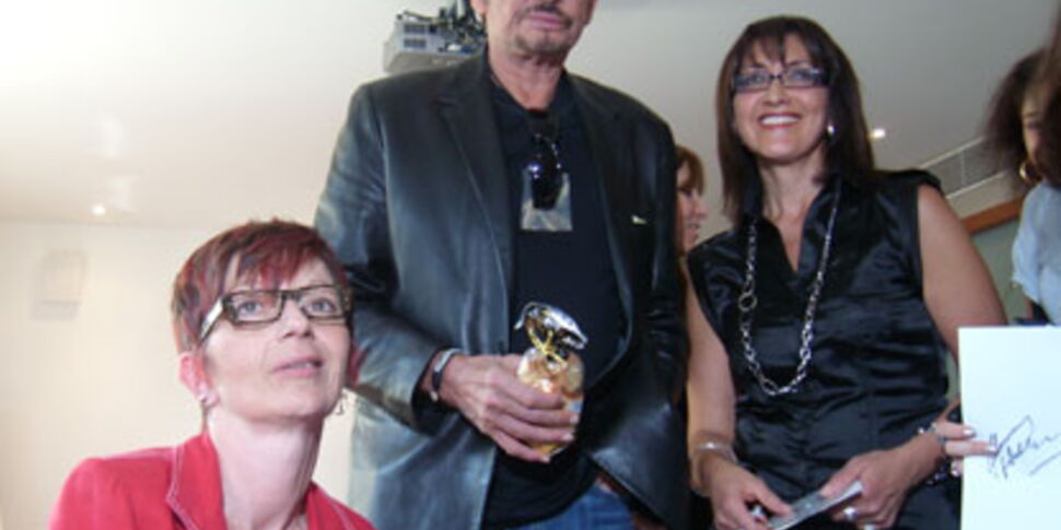Les fans de Johnny Hallyday : un moment unique avec leur idole : Femme ...